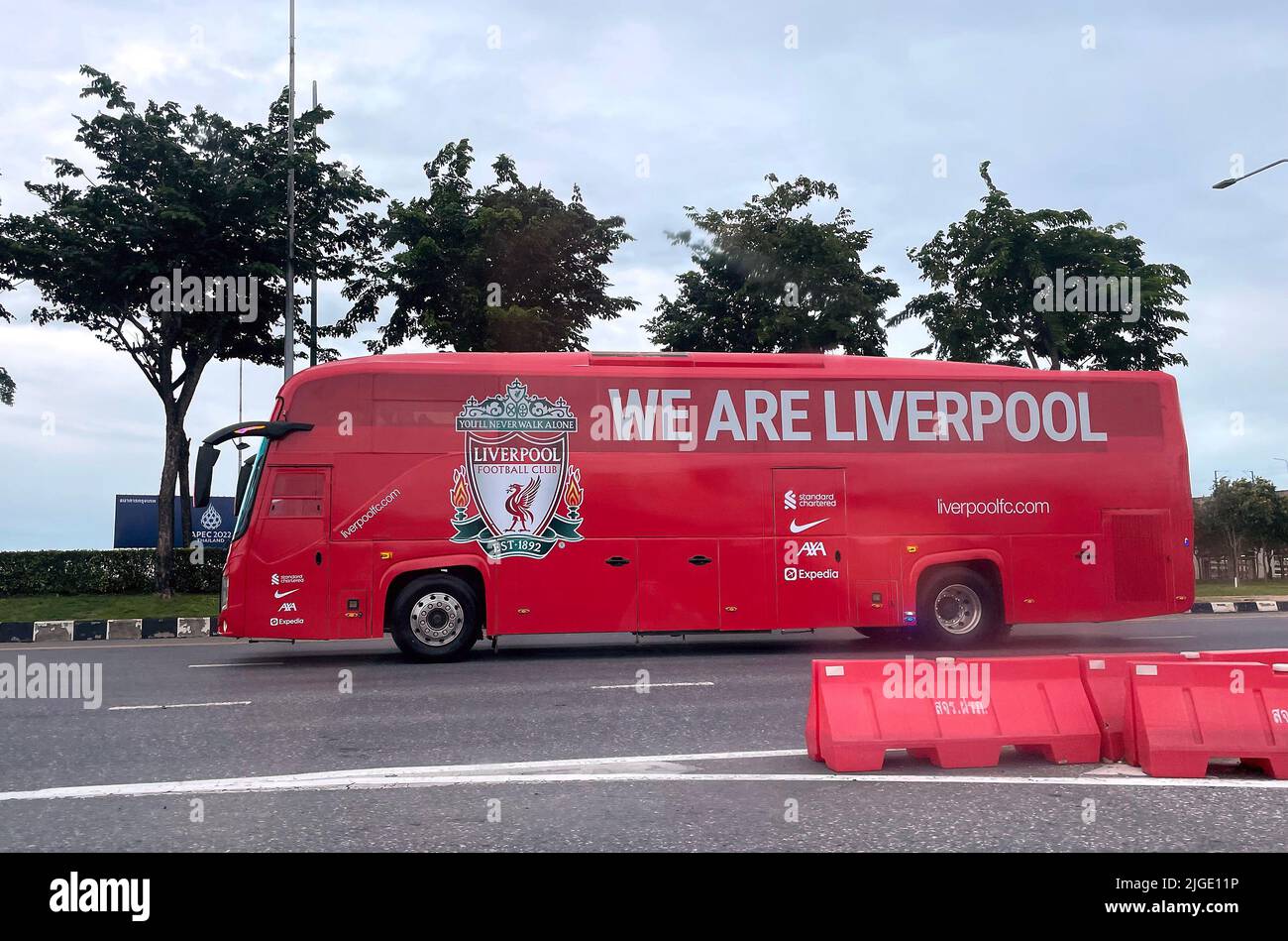 The Liverpool team bus leaves Suvarnabhumi Airport after they arrive in ...