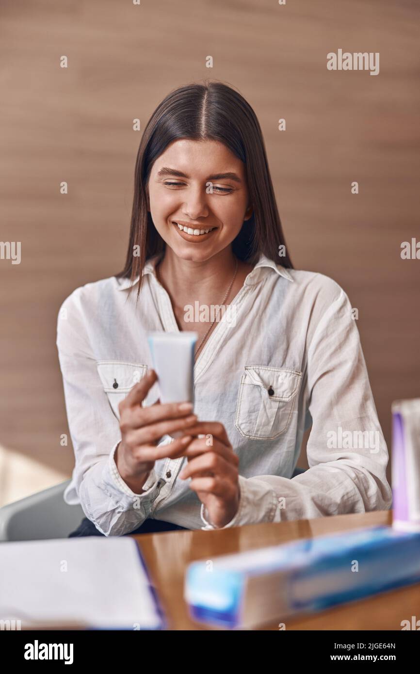 Happy beautiful caucasian woman with toothpaste in modern clinic's ... Happy beautiful caucasian woman with toothpaste in modern clinic's ...