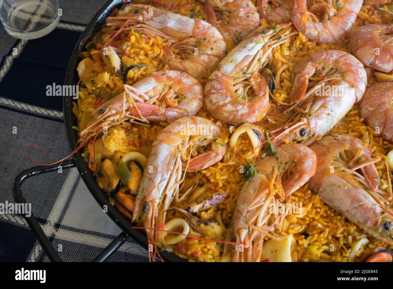 Cooking a fresh paella hi-res stock photography and images - Alamy