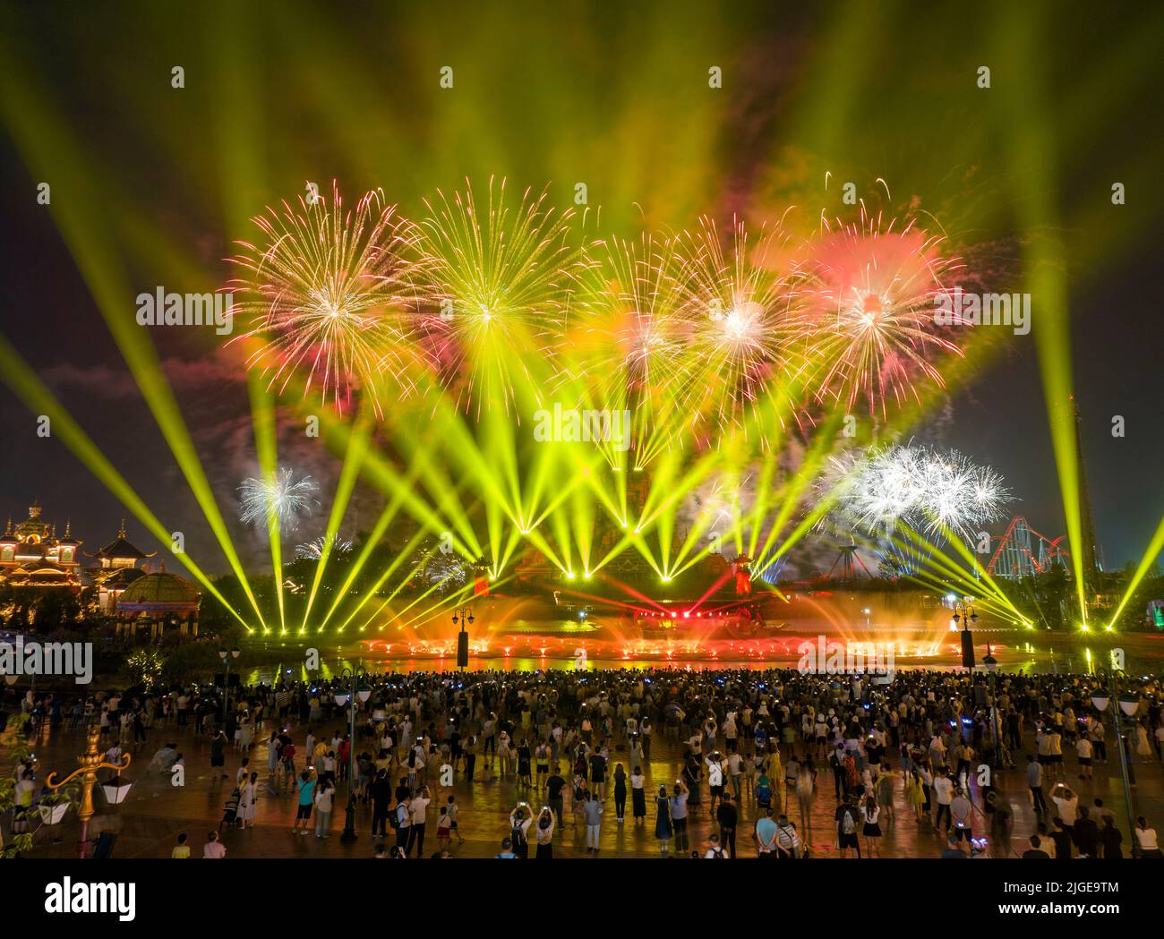 HUAI'AN, CHINA - JULY 9, 2022 - Tourists enjoy a float parade and a ...