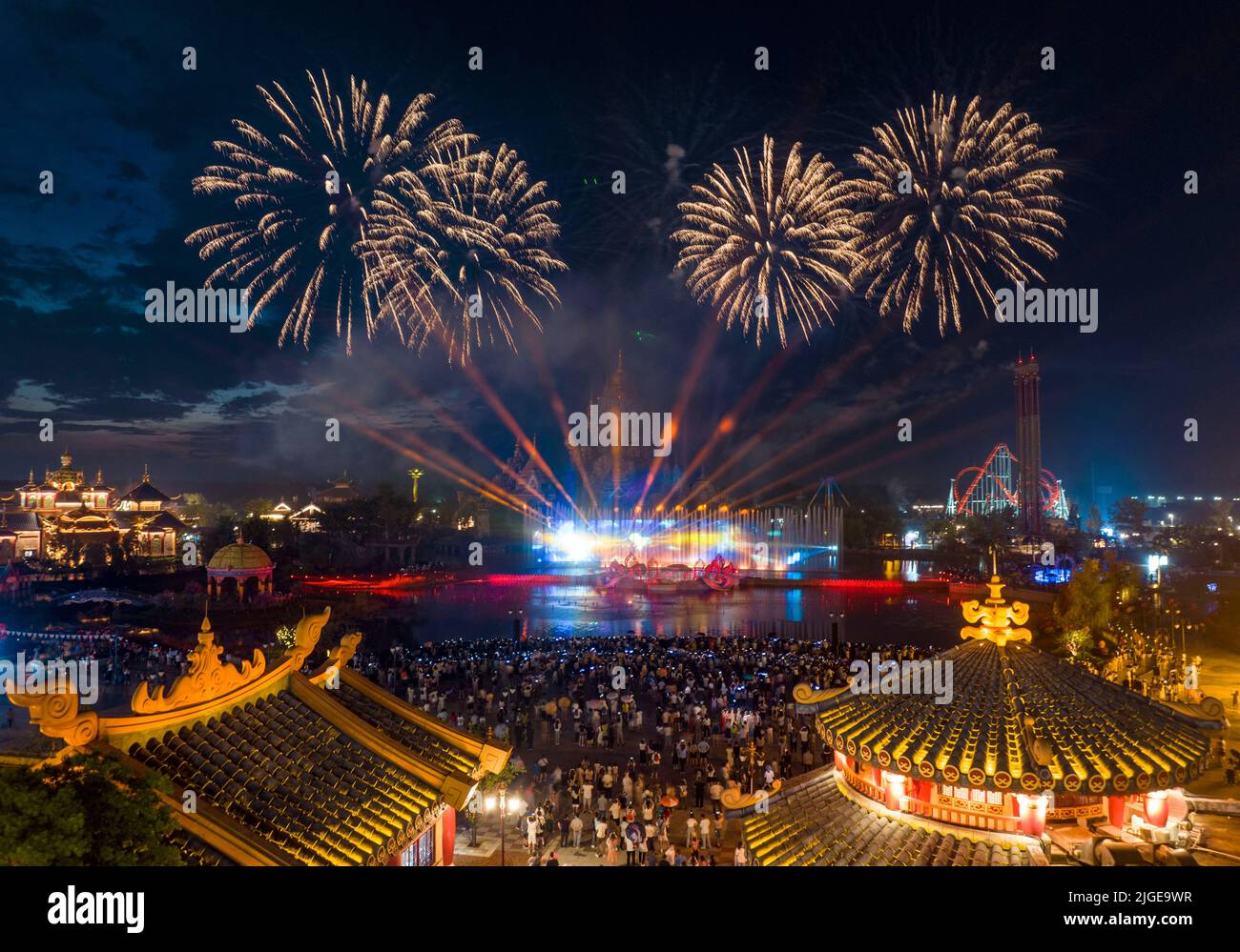 HUAI'AN, CHINA - JULY 9, 2022 - Tourists enjoy a float parade and a ...
