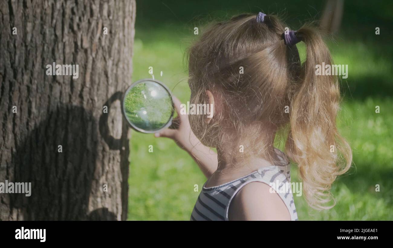 Child observing insects hi-res stock photography and images - Alamy