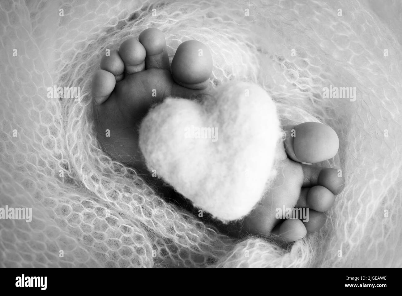Premature baby feet heart Black and White Stock Photos & Images - Alamy