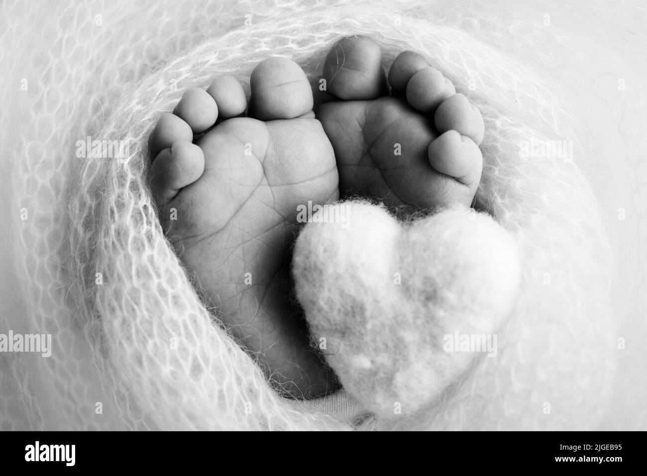 Premature baby feet heart hi-res stock photography and images - Alamy