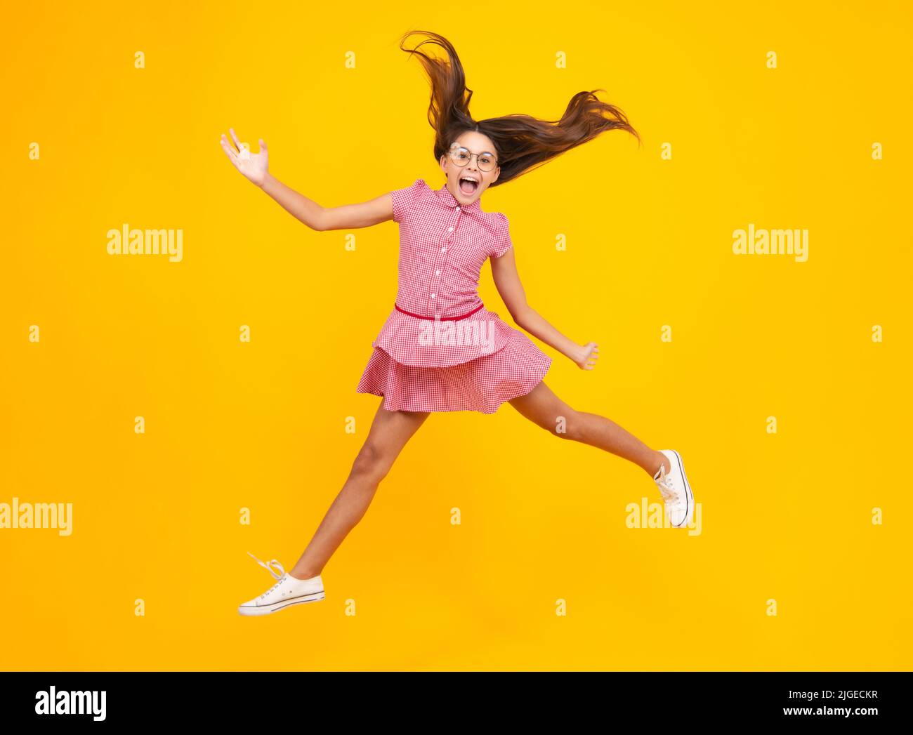 Amazed teen girl. Excited expression, cheerful and glad. Full length ...