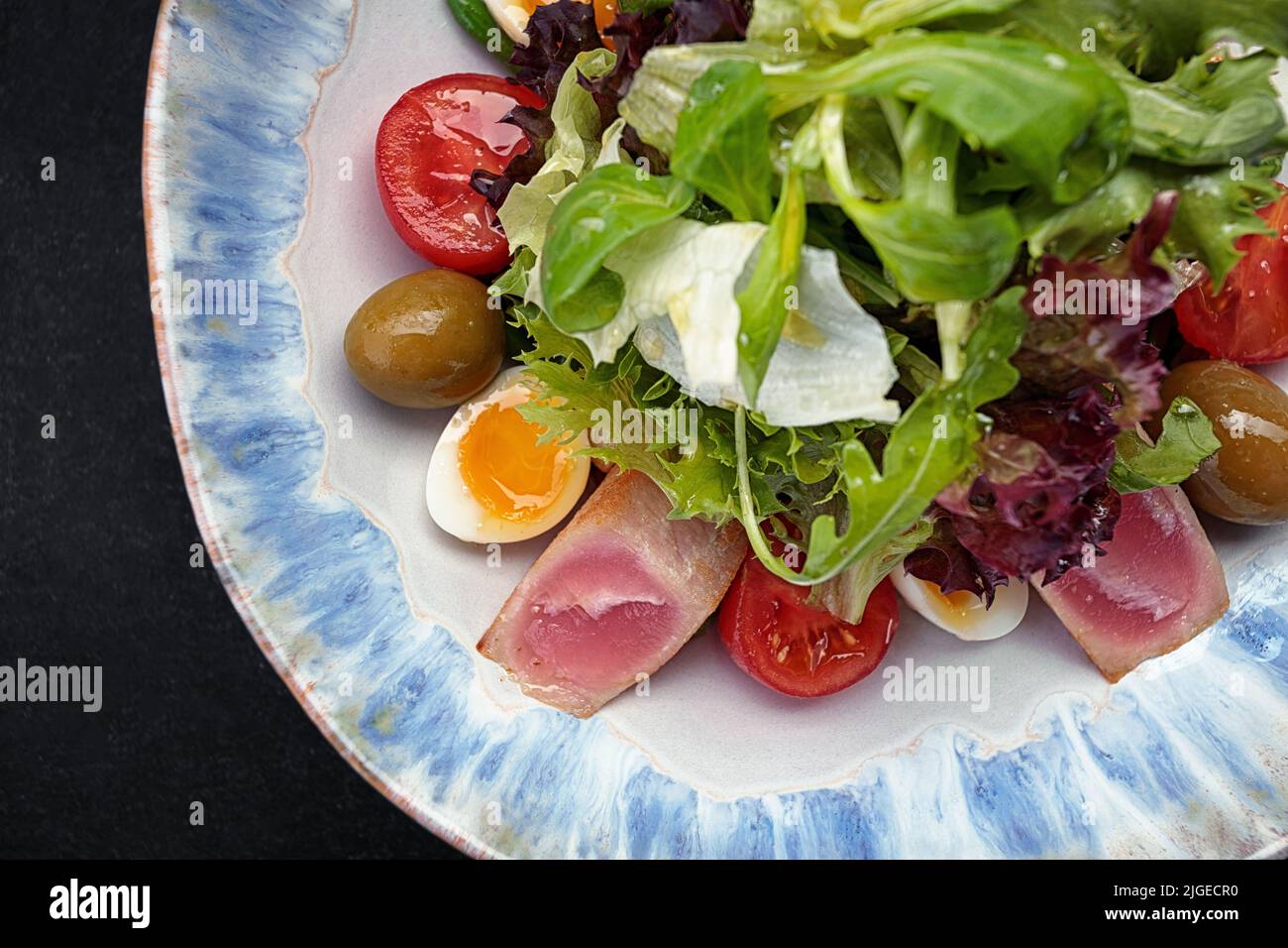 Nicoise salad with tuna, on a plate Stock Photo - Alamy