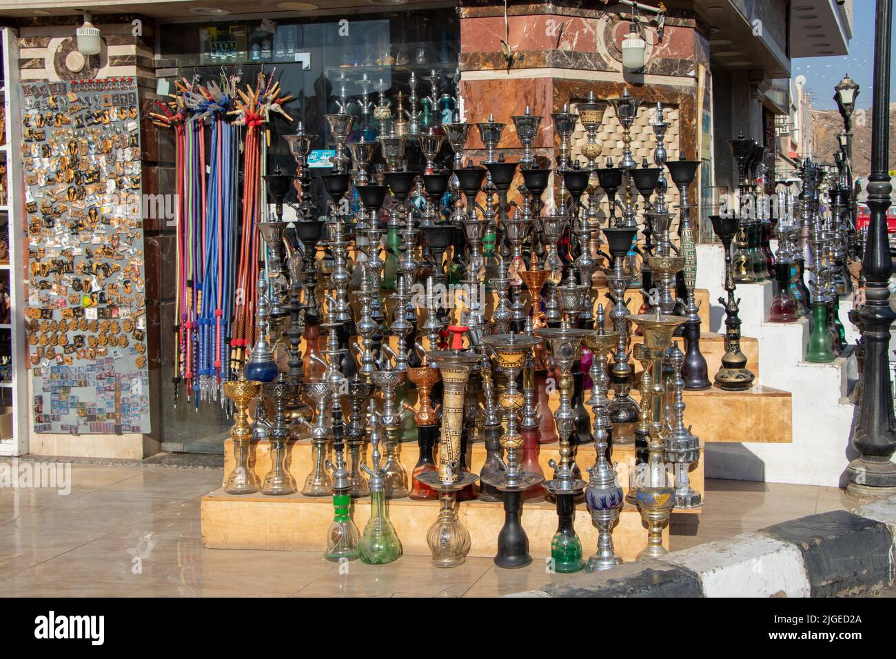 Hookahs of large and small sizes are made of glass on the market in ...