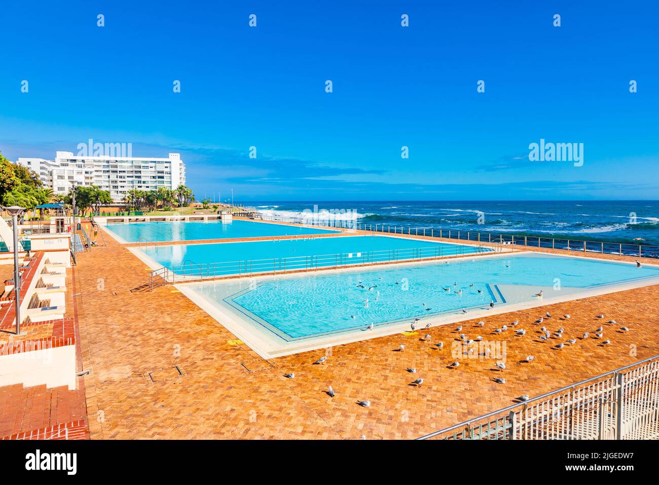 View of Pavilion Public Swimming Pool on Sea Point promenade in Cape ...