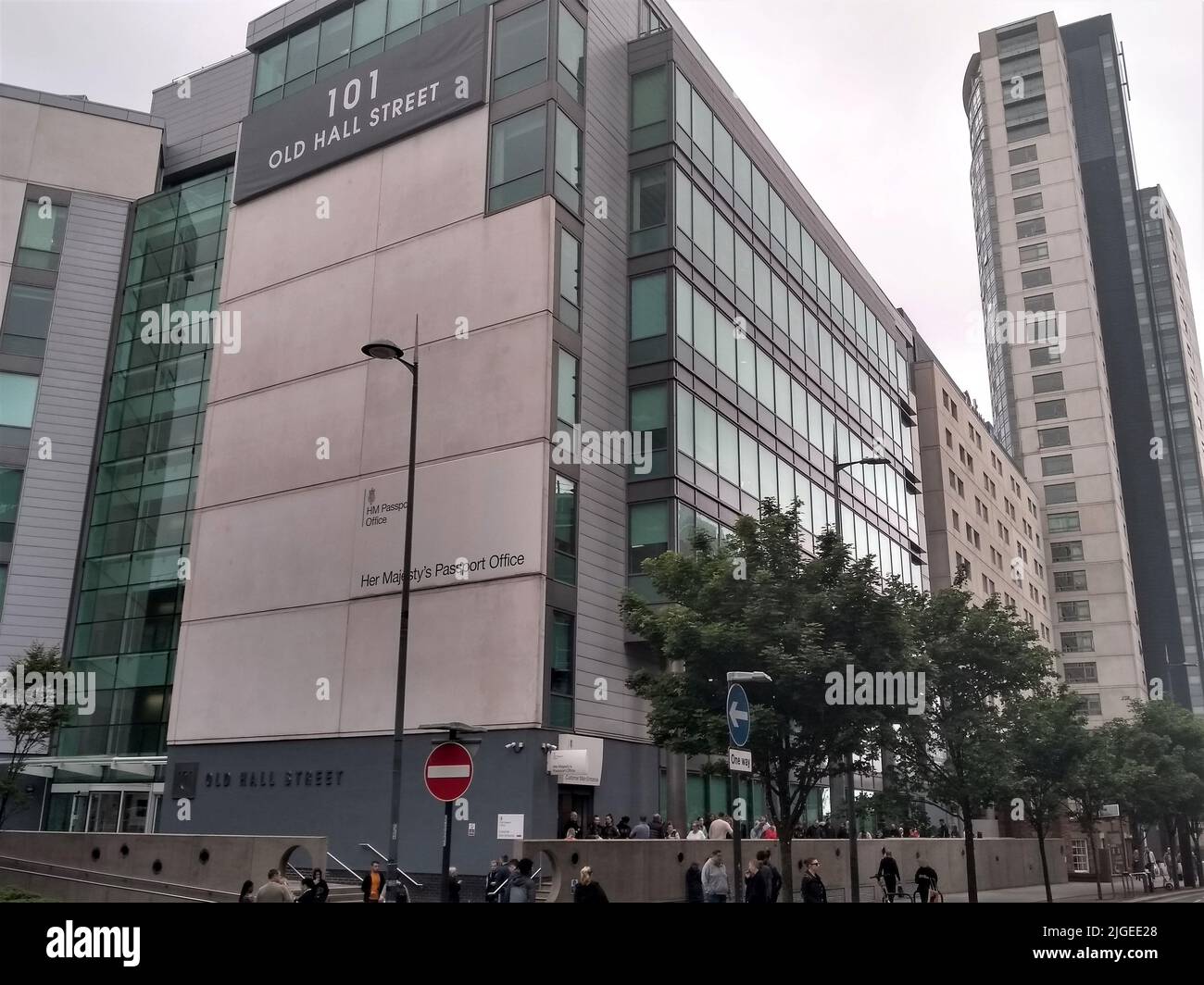 Queue of People at Passport Office Stock Photo - Alamy