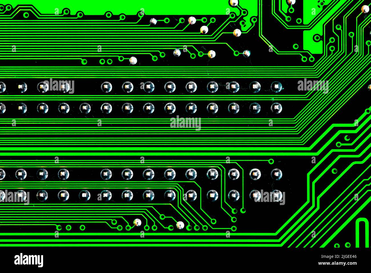 Macro Close up of printed wiring on green PC circuit board Stock Photo ...