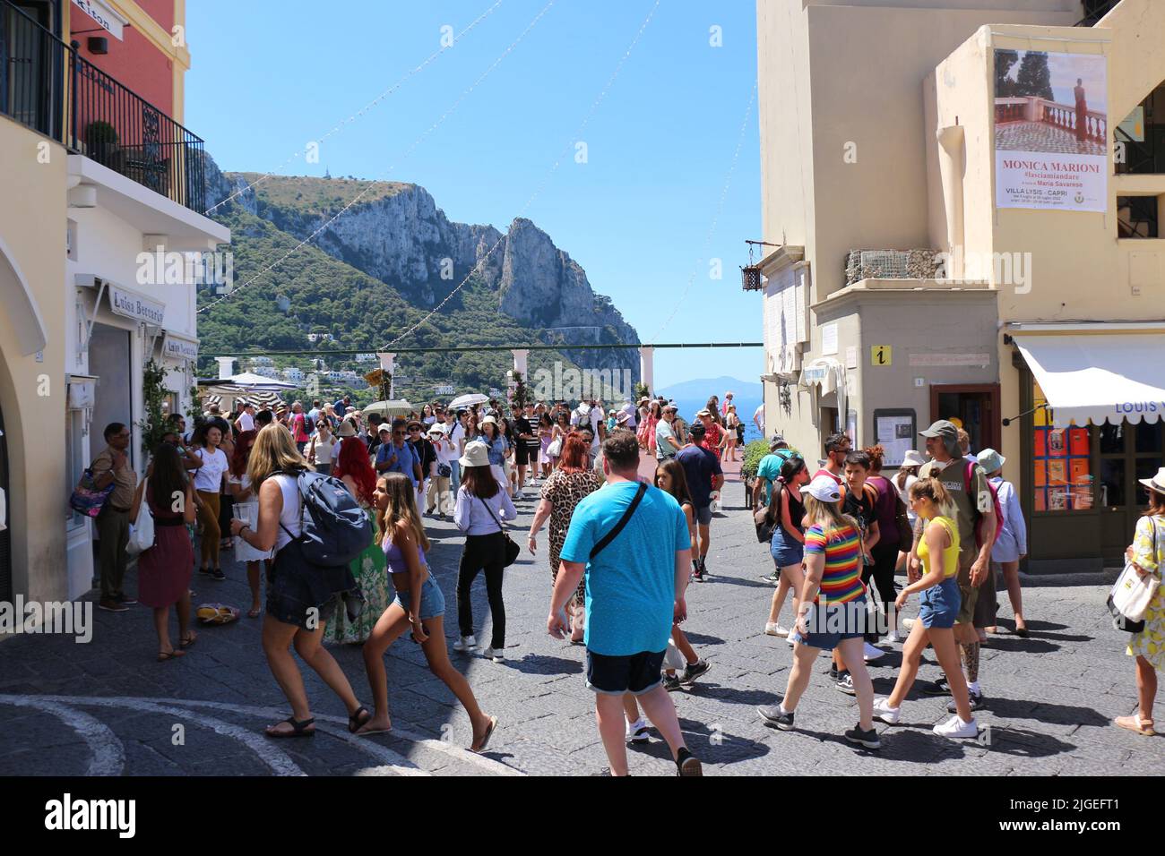 Summer in Capri island (Italy): tourists stroll in famous Piazzetta ...
