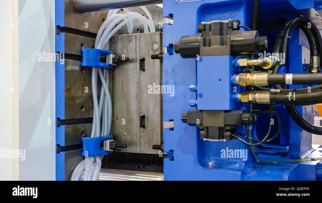 Large industrial equipment. Injection molding machine Stock Photo - Alamy