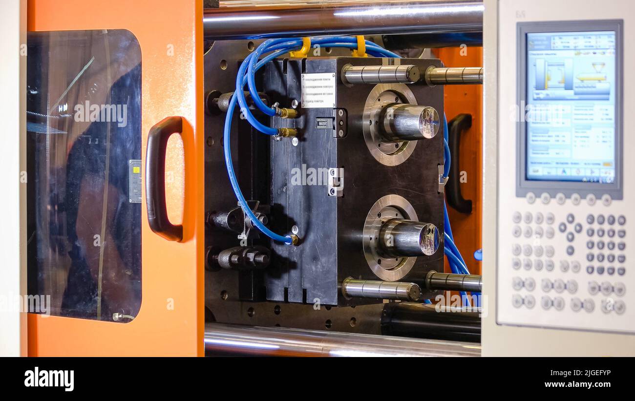 Industrial factory equipment .Injection molding machine with control ...