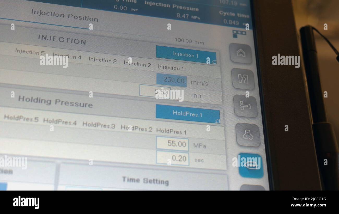 Menu on the large touch screen. Industrial injection molding machine ...
