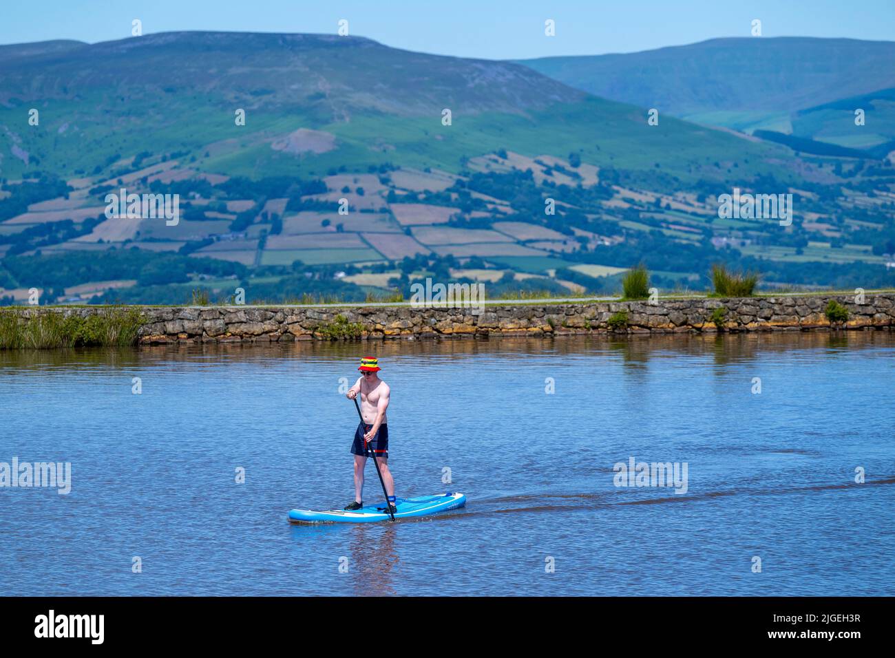 People enjoy the water at Keeper's Pond near Abergavenny in ...