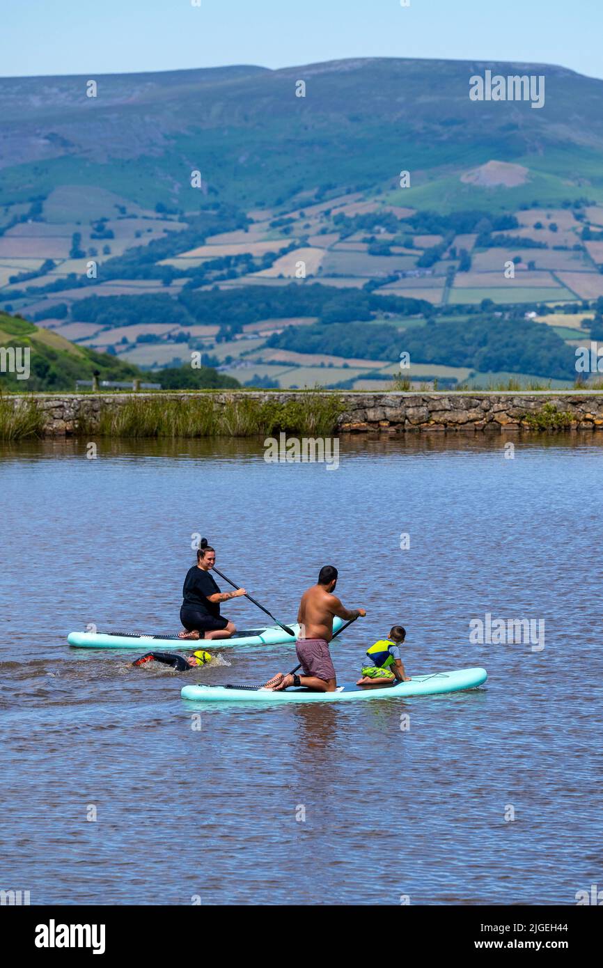 People enjoy the water at Keeper's Pond near Abergavenny in ...