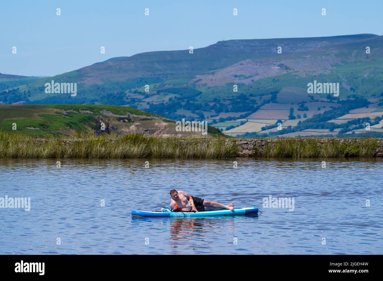 People enjoy the water at Keeper's Pond near Abergavenny in ...