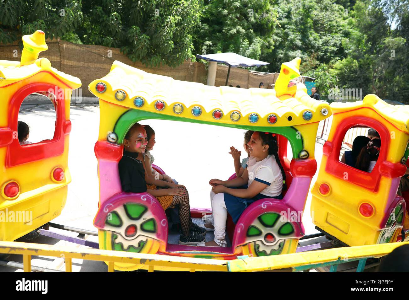 Giza, Egypt. 10th July, 2022. Children enjoy themselves at a playground ...