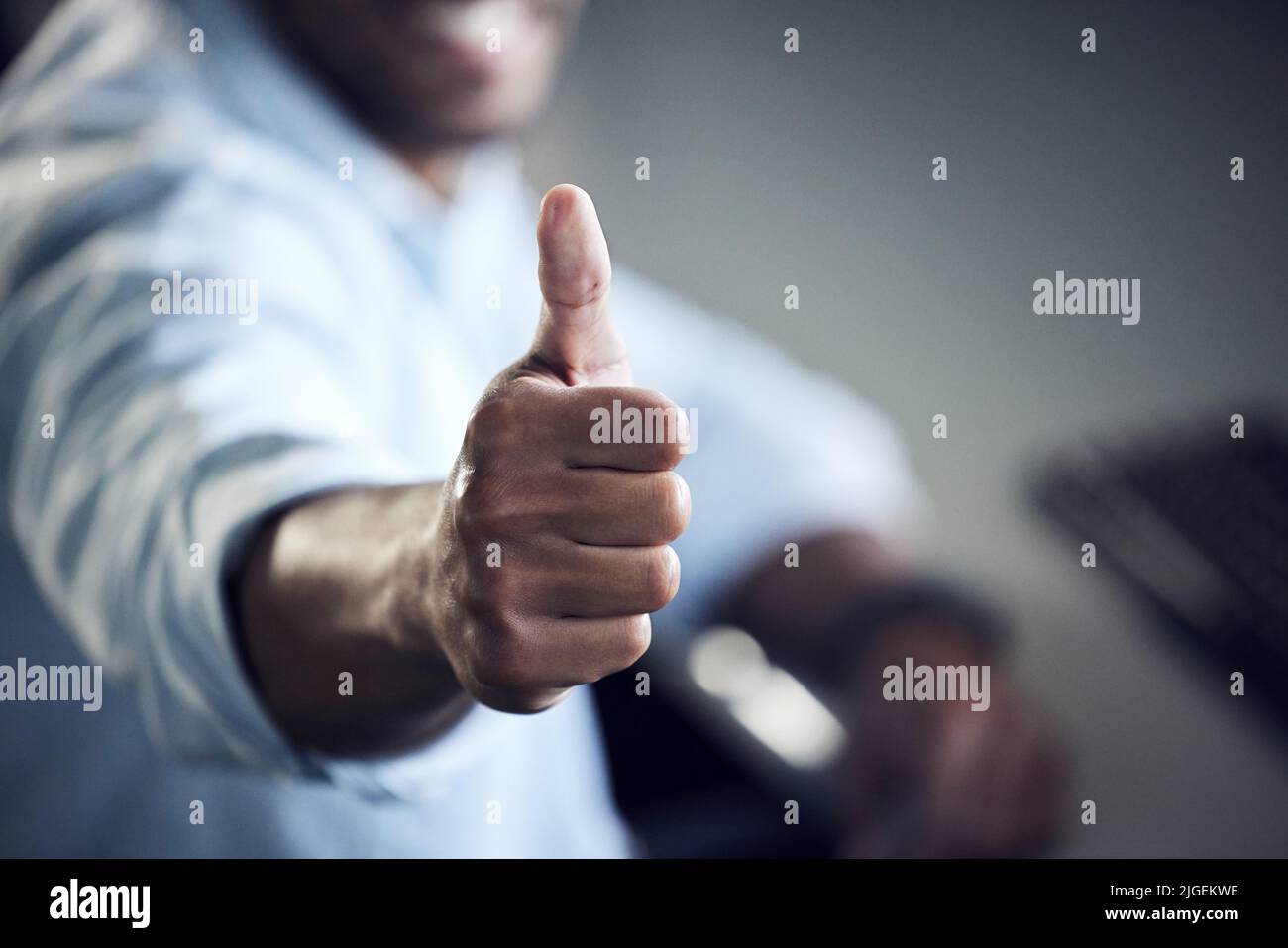 I got my degree in IT. an unrecognisable man showing thumbs up and ...