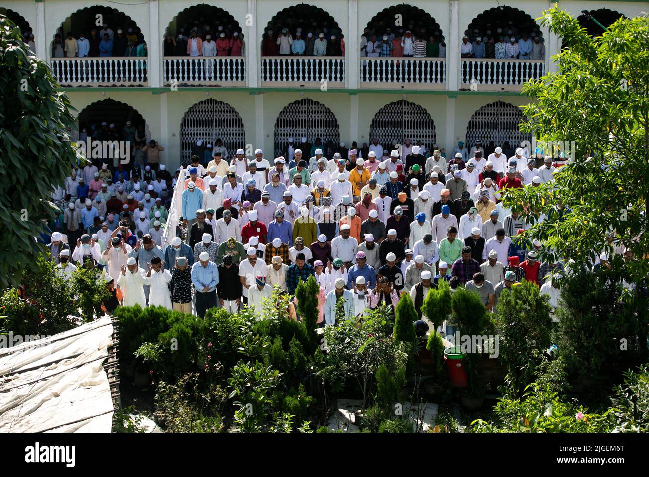 Nepali Muslims attend the mass prayers during the Eid al-Adha ...