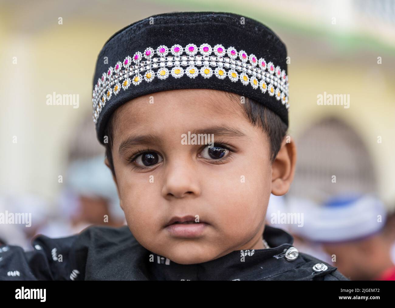A Nepali Muslim boy seen at the mosque during the Eid al-Adha prayers ...