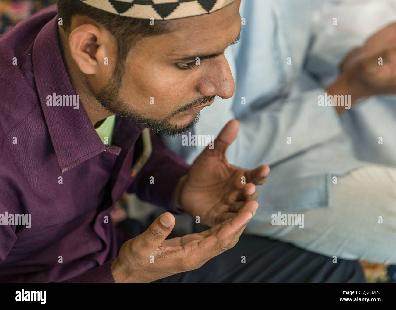 Nepalese Muslim performs the Eid al-Adha prayers at a Mosque. Muslims ...