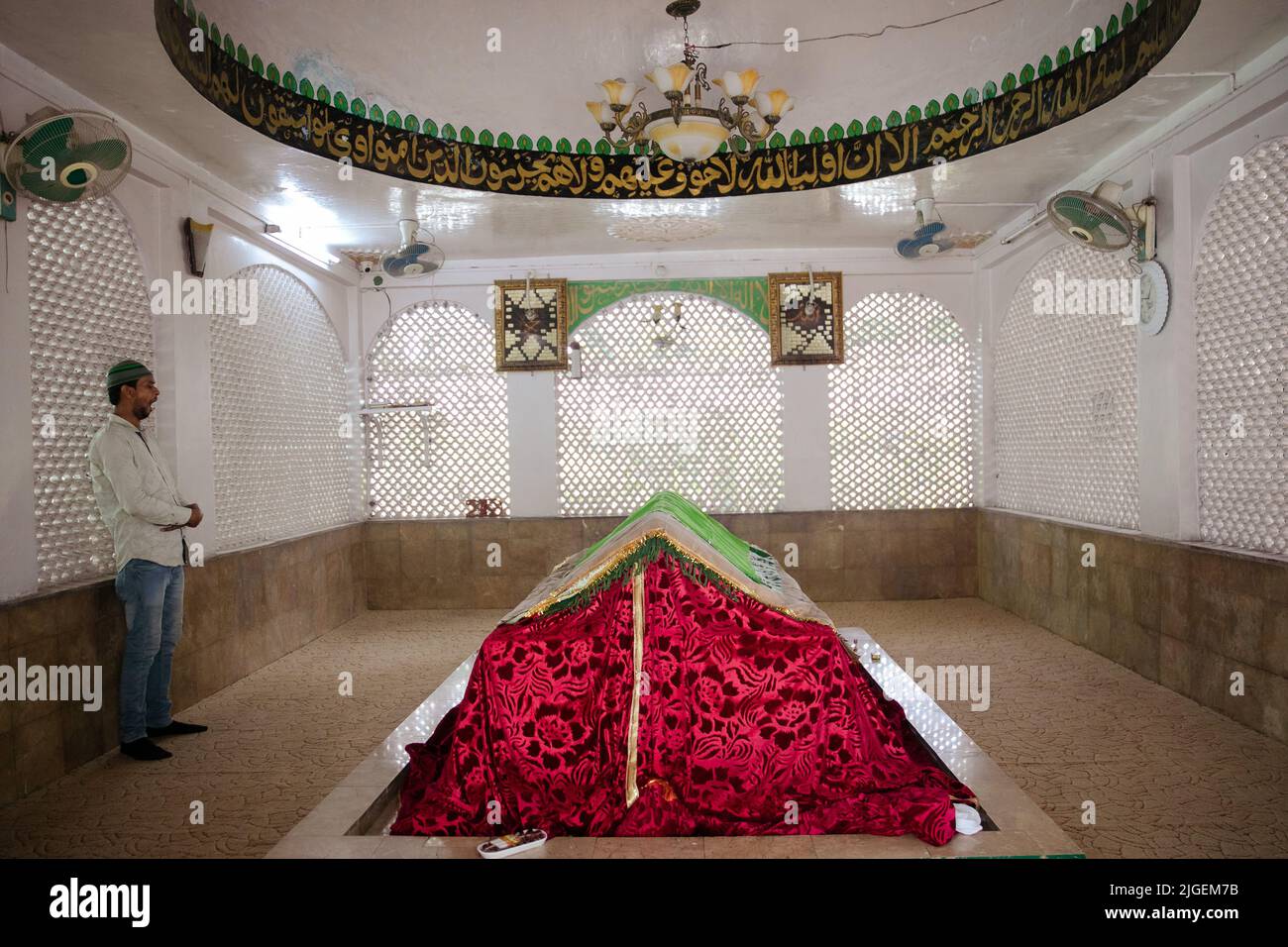A Nepali Muslim performs prayers during the Eid al-Adha celebrations at ...