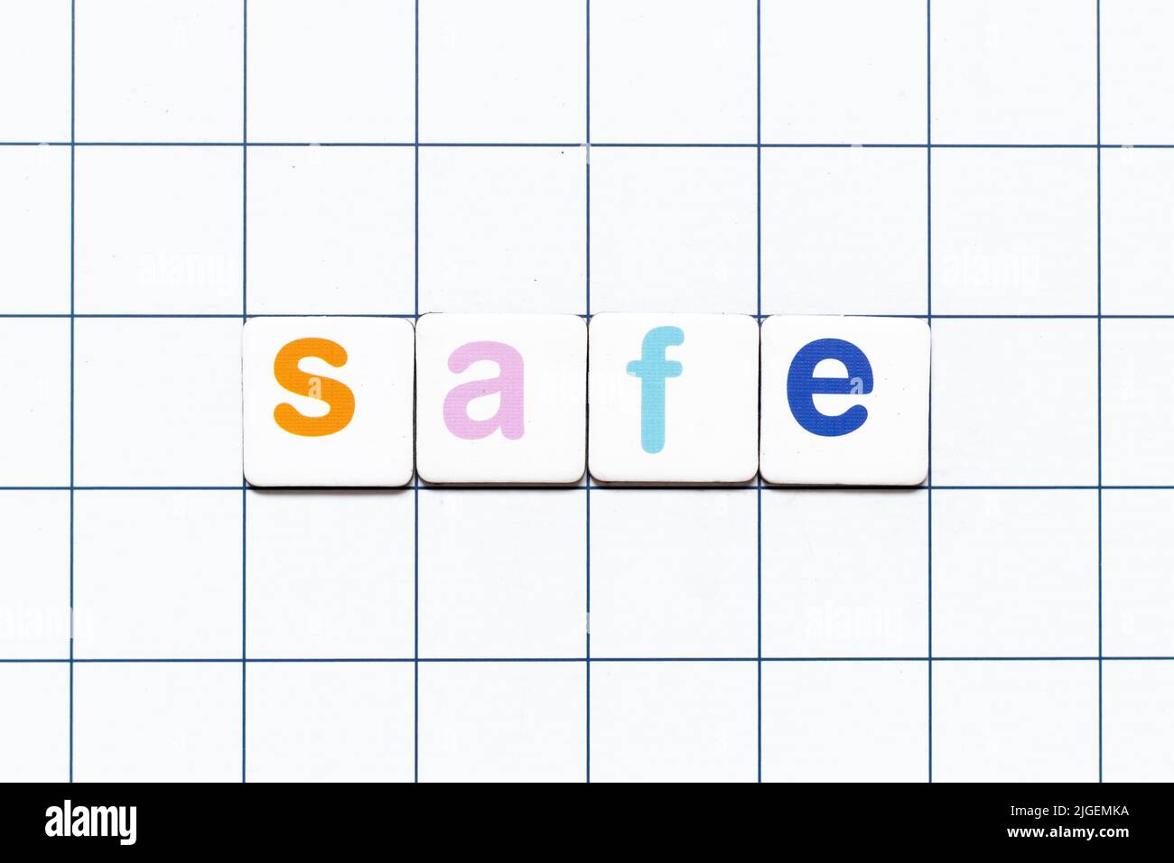 Colorful tile letter in word safe on white grid background Stock Photo ...