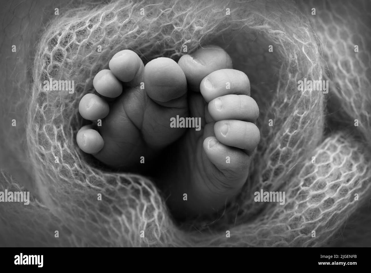 Premature baby feet Black and White Stock Photos & Images - Alamy