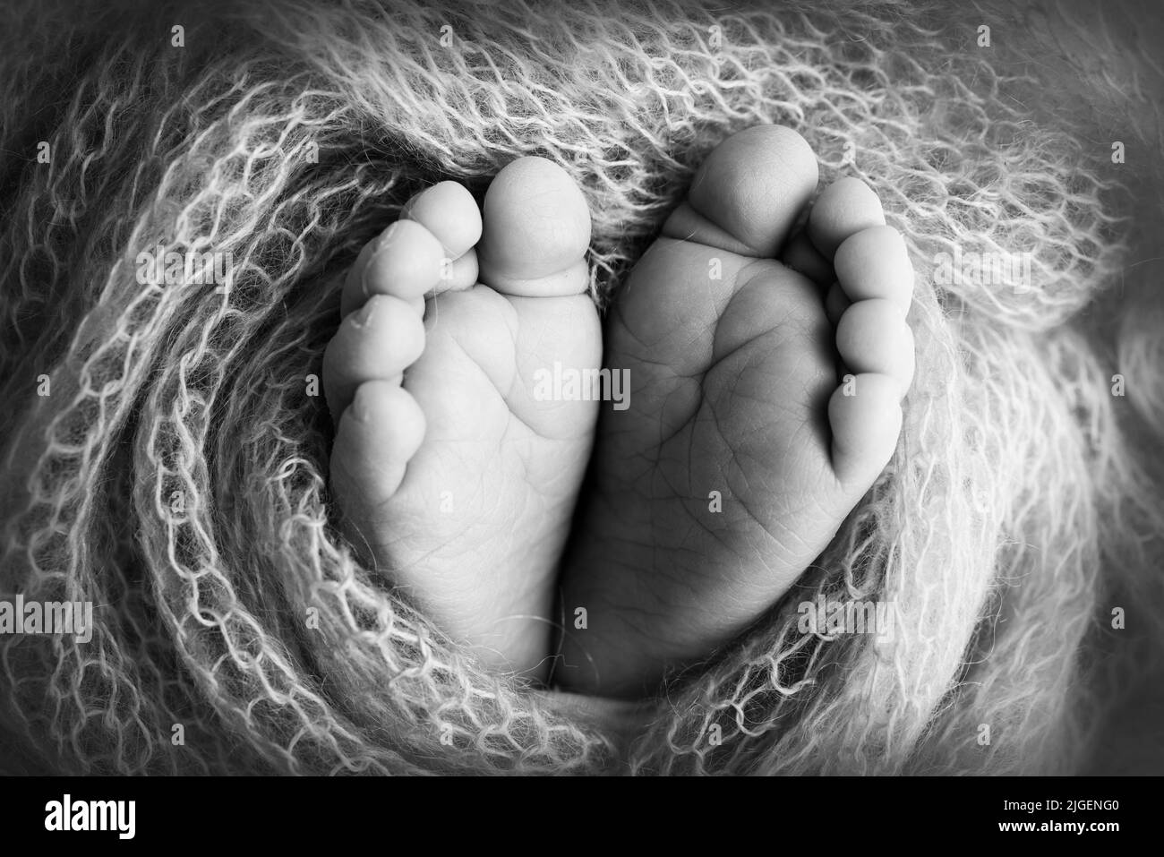 Premature baby feet Black and White Stock Photos & Images - Alamy