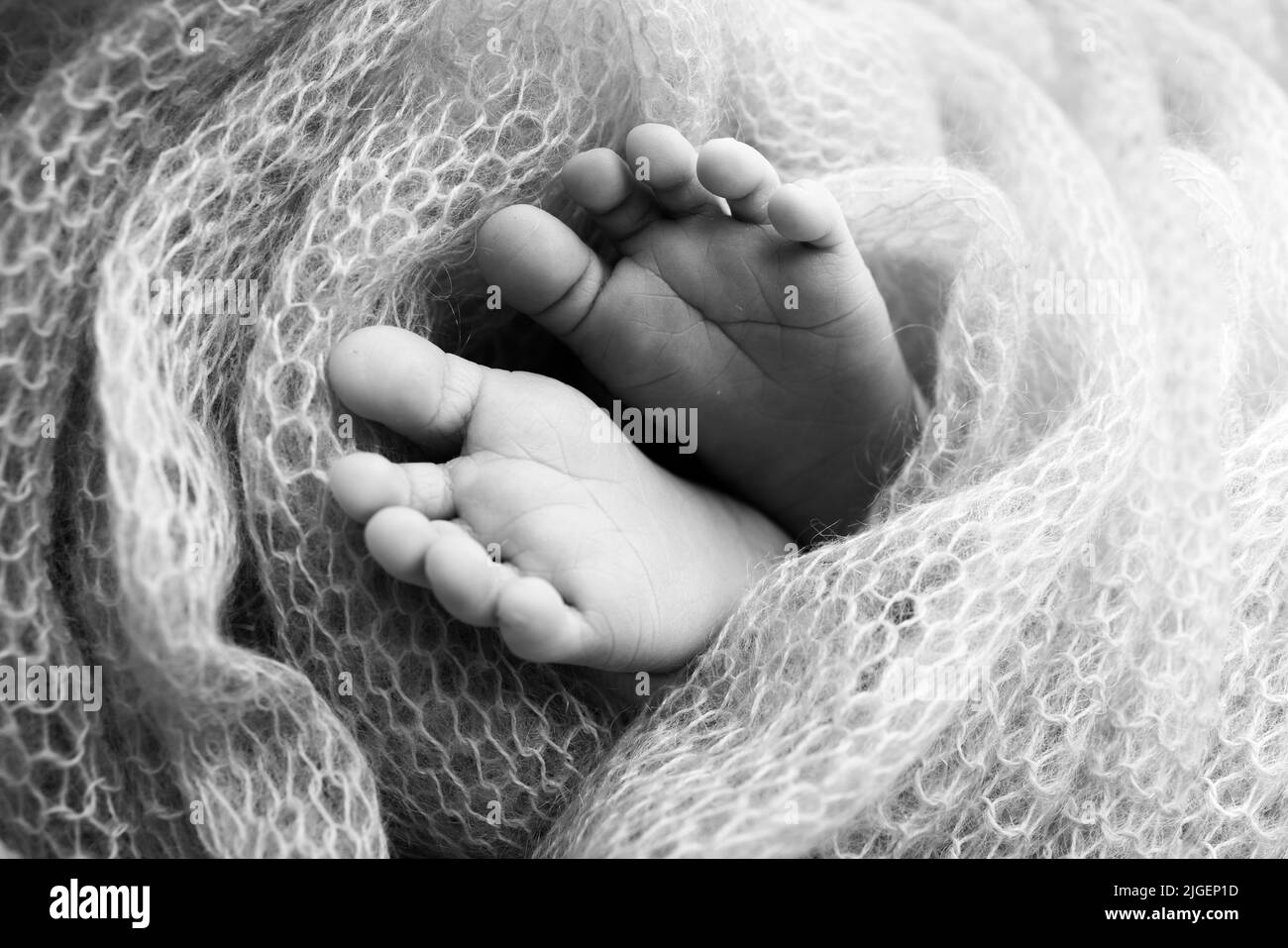 Premature baby feet heart Black and White Stock Photos & Images - Alamy