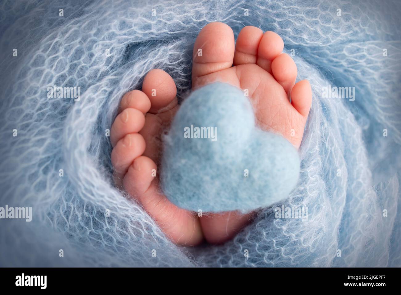 Premature baby feet heart hi-res stock photography and images - Alamy