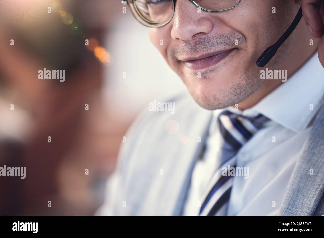 Hes got a good listening ear. an unrecognizable call center agent at ...
