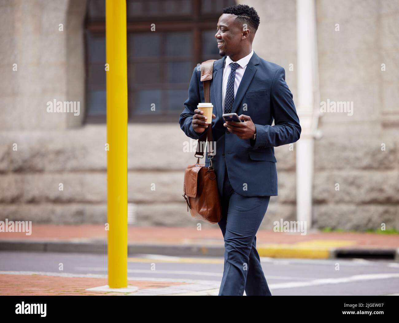 Man cross street with phone hi-res stock photography and images - Alamy