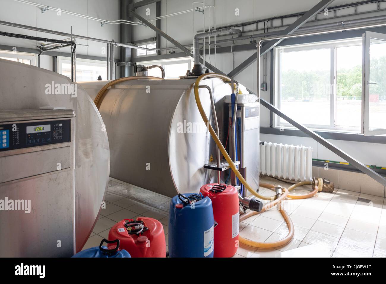a system of tanks and containers for storing milk after cows are milked ...