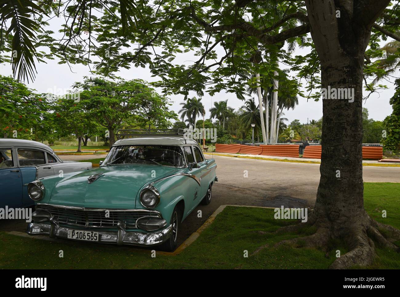 Tropical landscape with scenic view of a vintage car at the Boca de ...