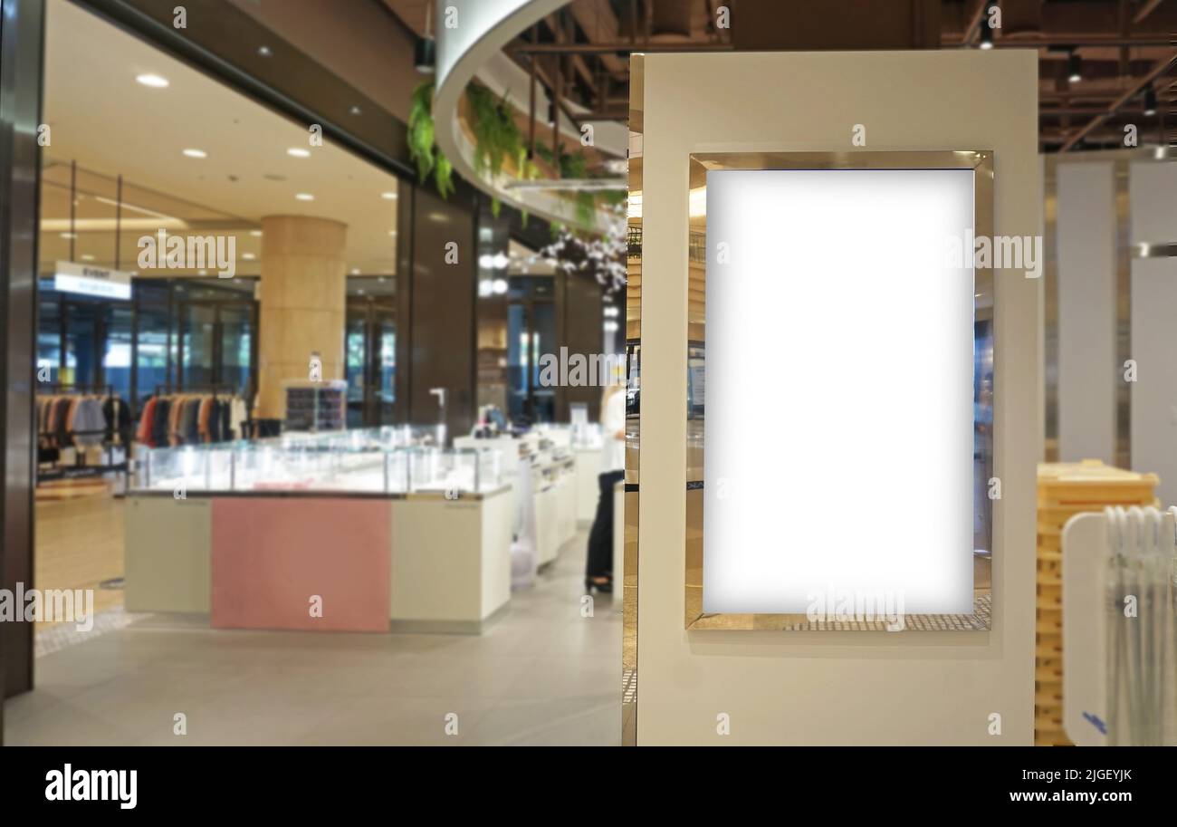 Advertising poster board inside department store Stock Photo - Alamy