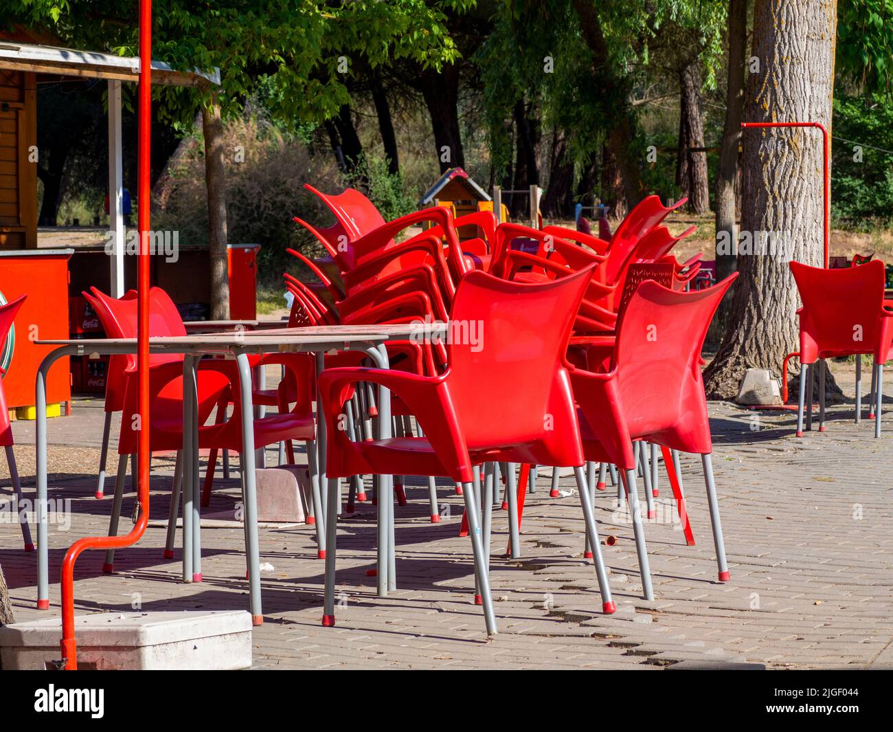 Empty chairs on the terrace of a bar due to the heat wave. climate ...