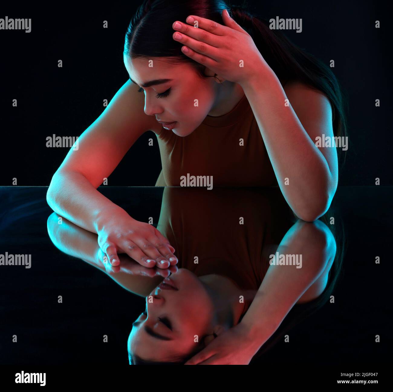 Sometimes its all about lighting. an attractive young female ballerina ...