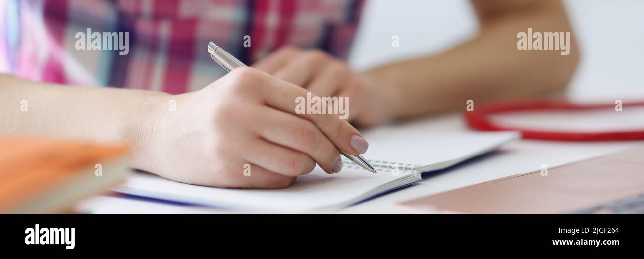 Person writing down ideas in diary, making notes for future, planning ...