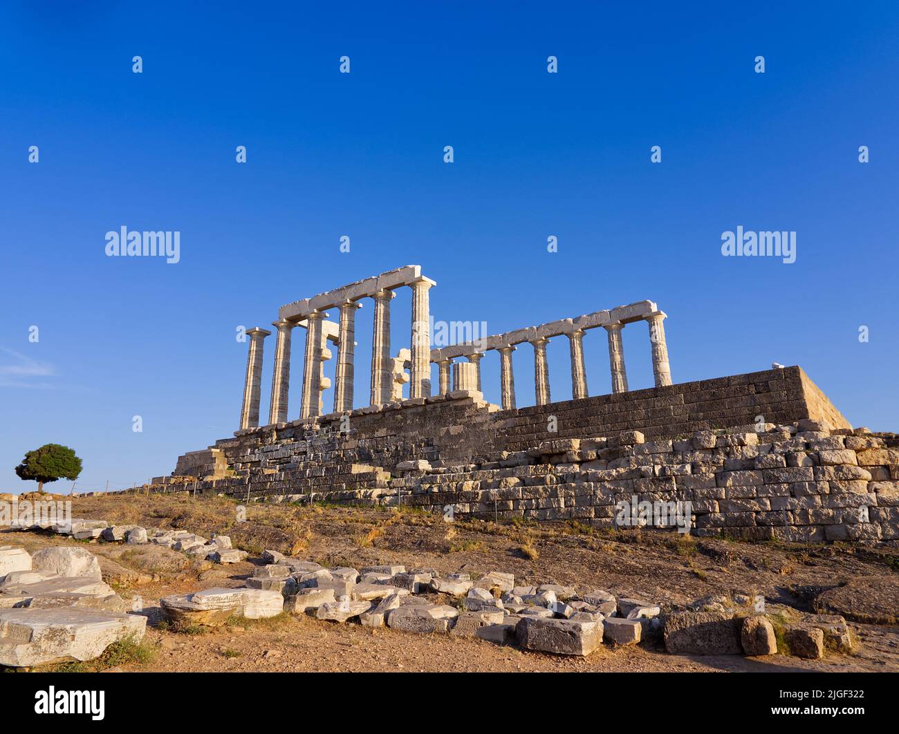 Ancient Temple of Poseidon during sunset at Sounio, Greece Stock Photo ...
