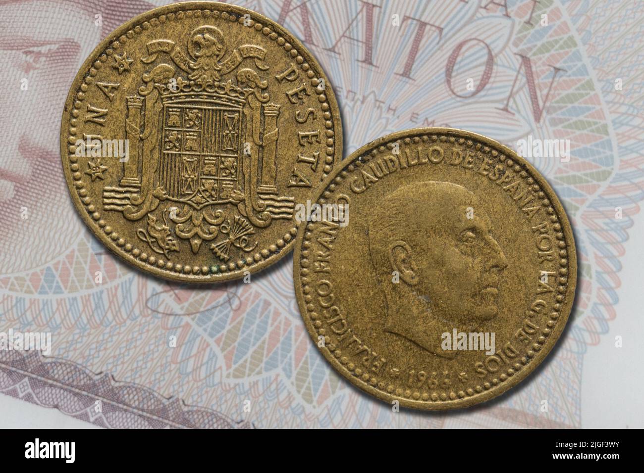 A two pieces of Spanish peseta coin Stock Photo - Alamy