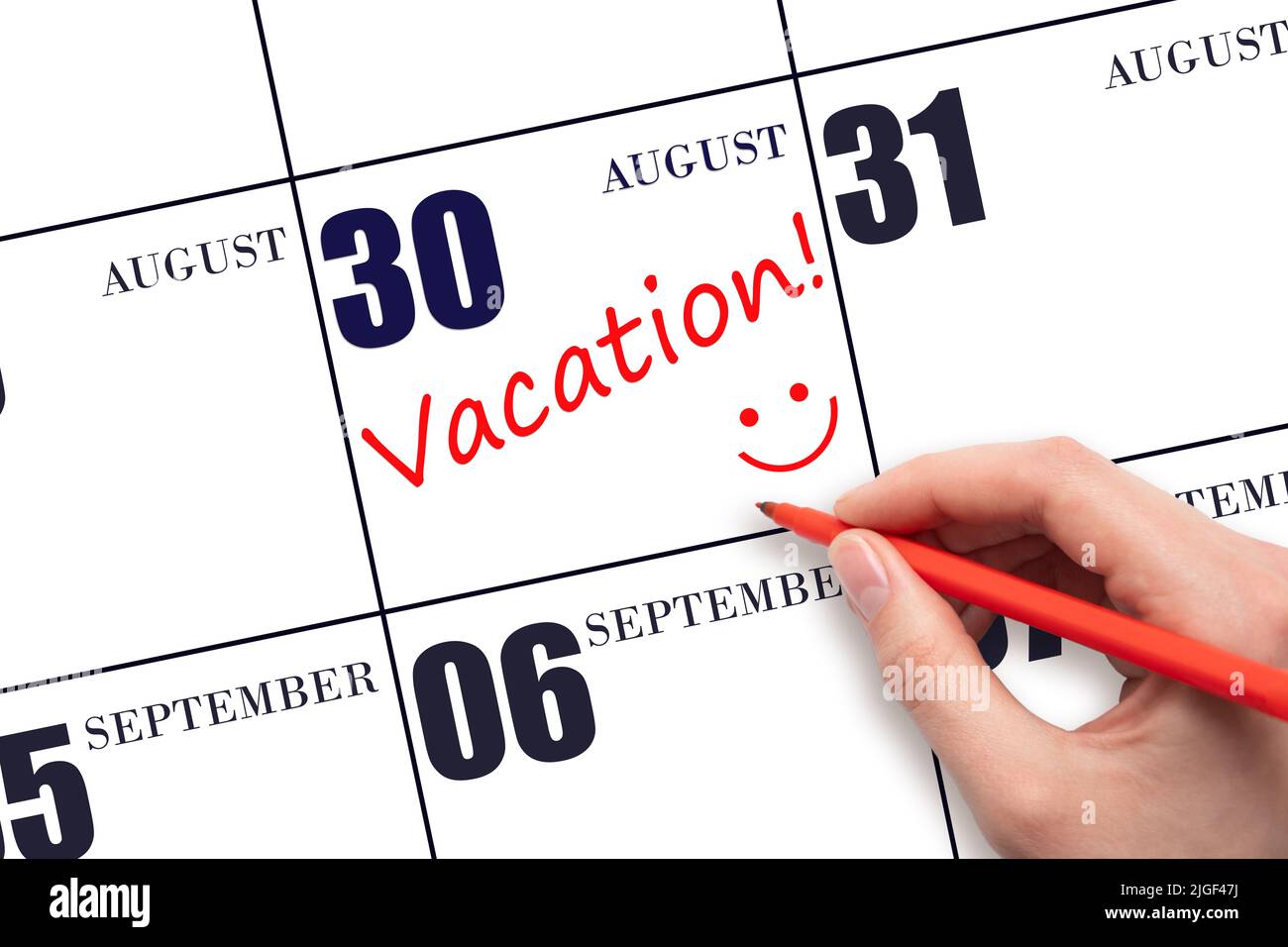 30th day of August. A hand writing a VACATION text and drawing a ...