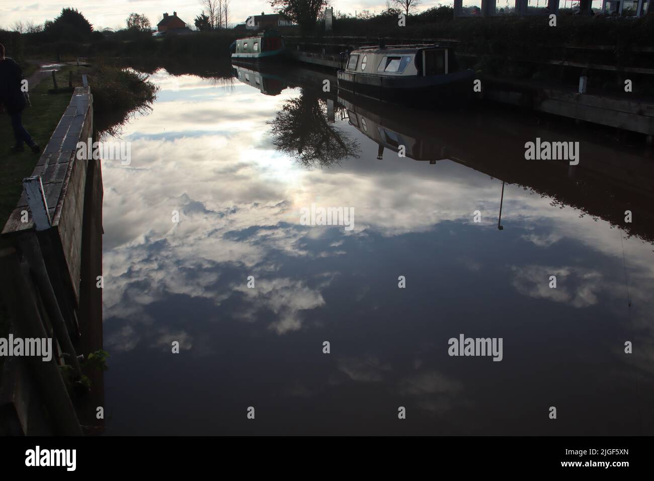 The sun sets on the Bridgewater and Taunton Canal in Somerset with ...