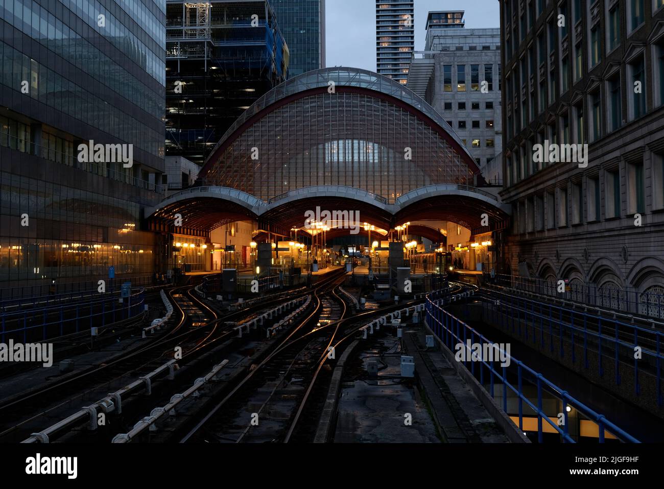 Canary Wharf Docklands Light Railway station at dusk Stock Photo - Alamy