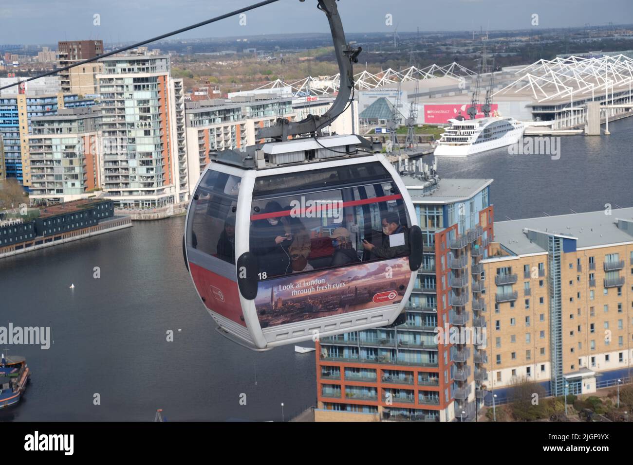 People on the London cable car above the Royal Docks Stock Photo - Alamy
