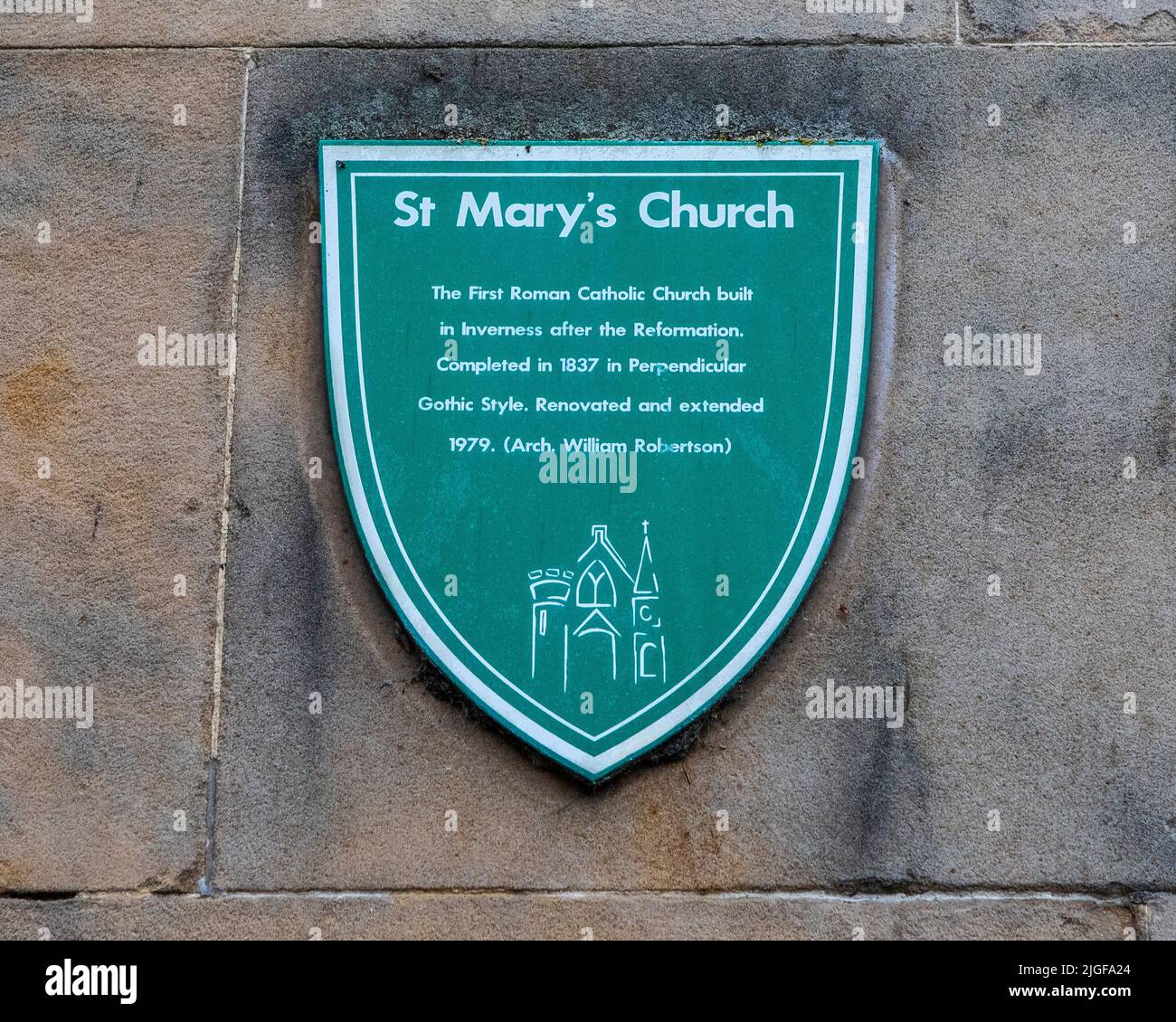 A plaque on the exterior of St. Marys Roman Catholic Church in the city ...