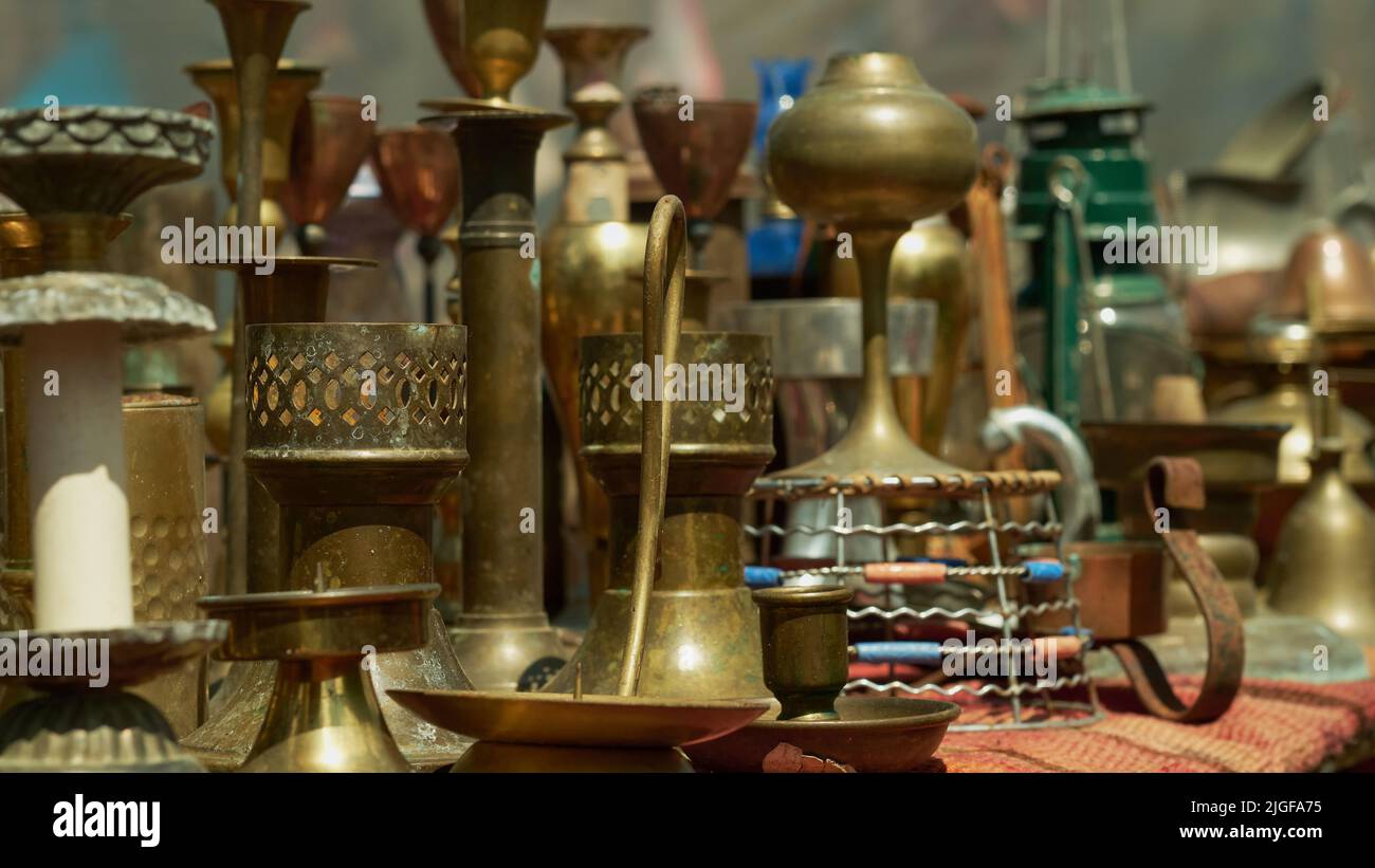 Many different size copper candlesticks Stock Photo - Alamy