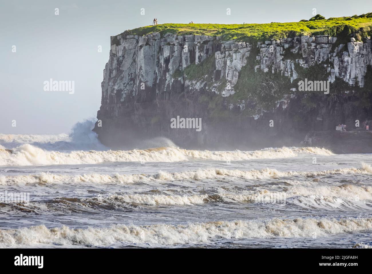 Famous cliffs in Torres Beach and big waves breaking, Rio Grande do Sul ...