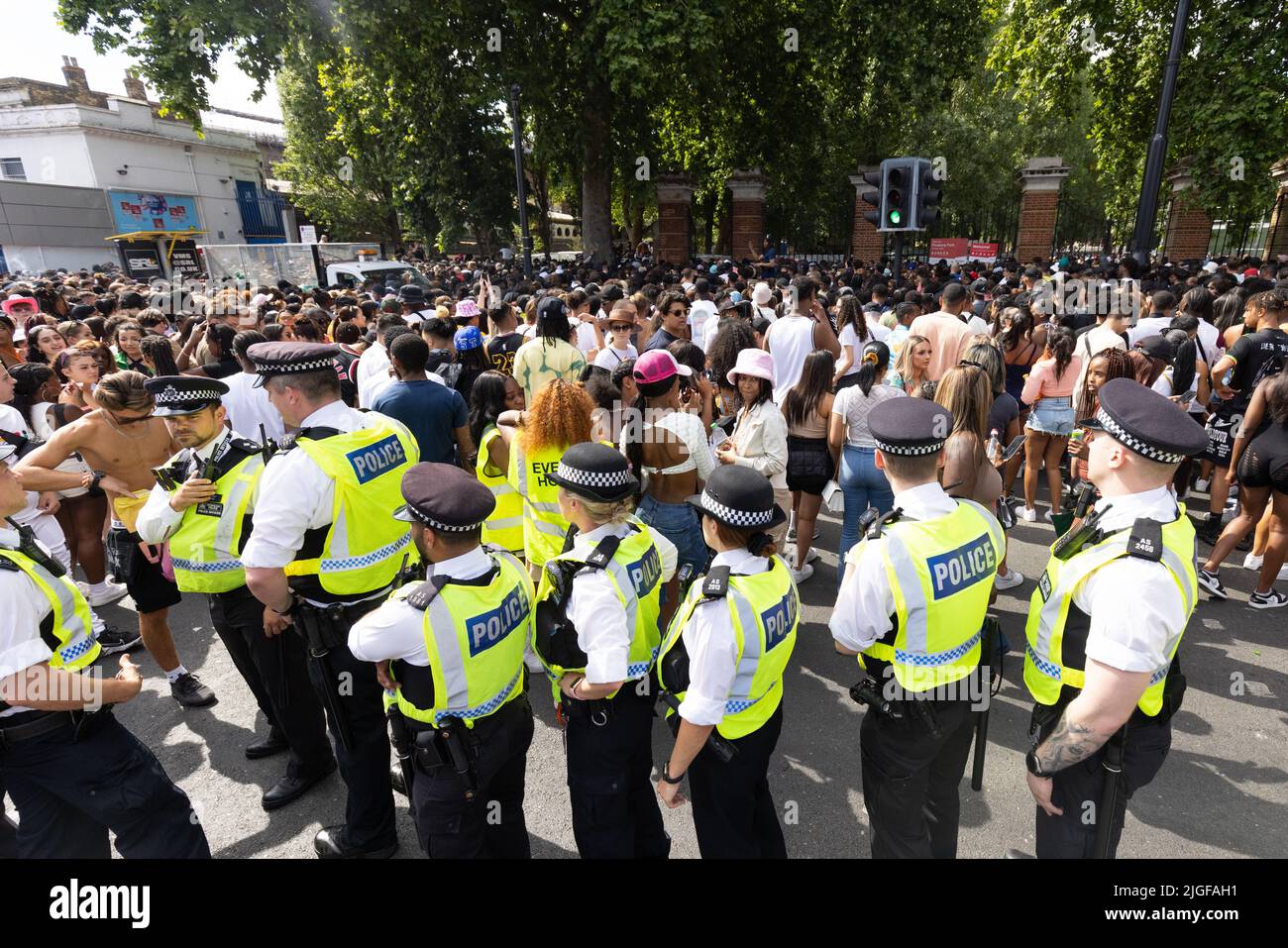 Crowds wait outside as big queues form at the entrance to Wireless ...